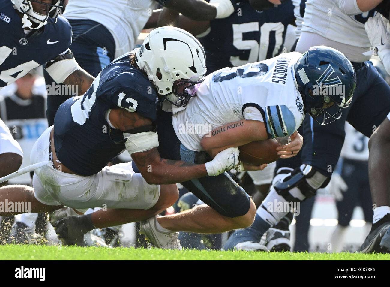 Penn State linebacker Tony Rojas (13) sacks Villanova quarterback ...