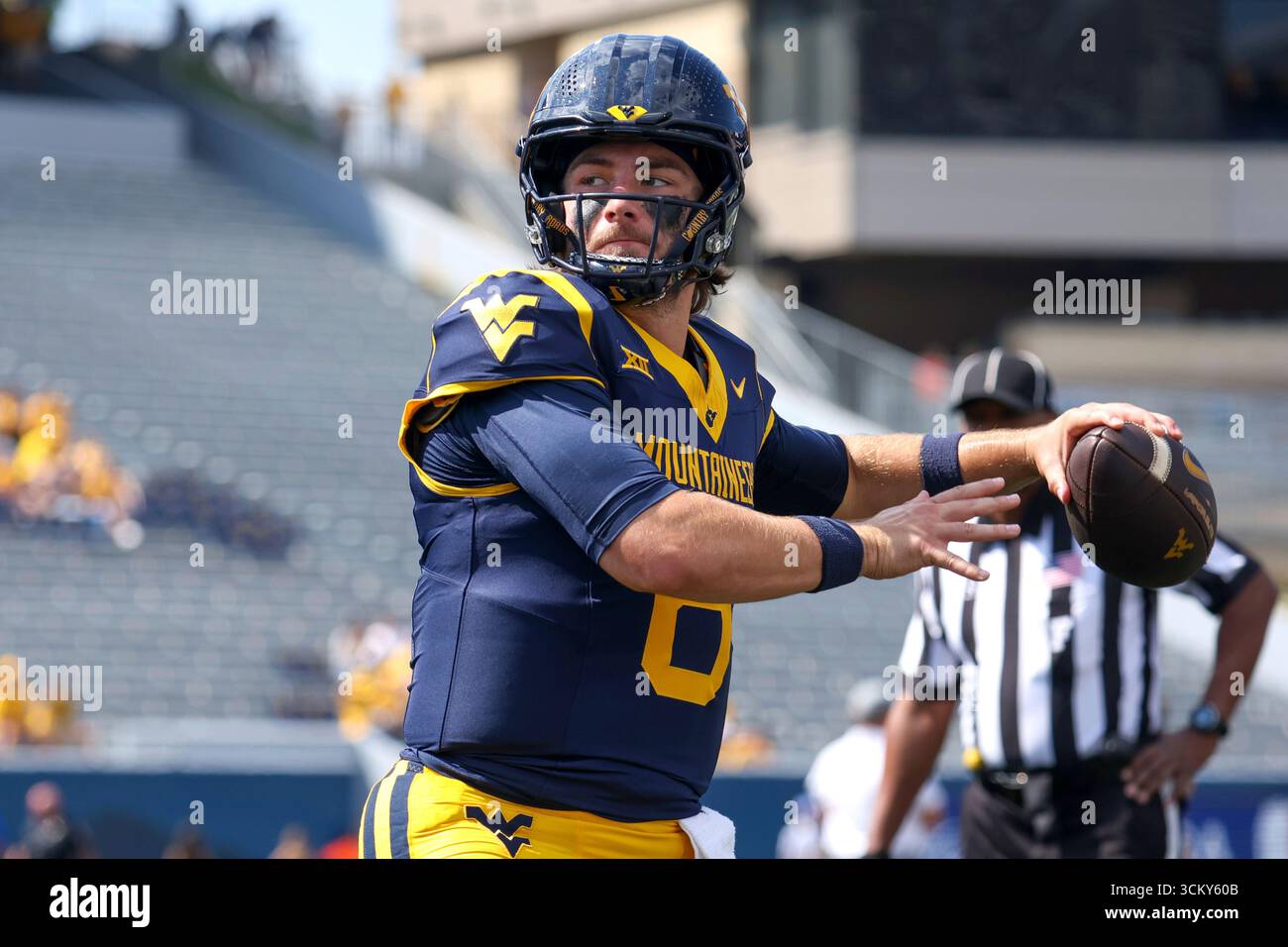 MORGANTOWN, WV - SEPTEMBER 13: West Virginia Mountaineers quarterback ...