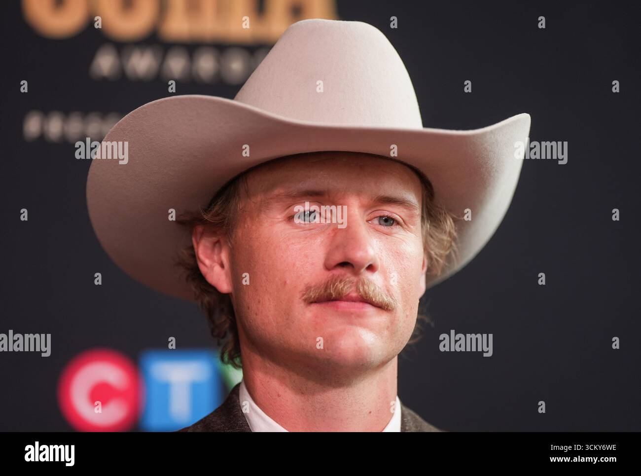 James Barker, of The James Barker Band, arrives on the red carpet at ...