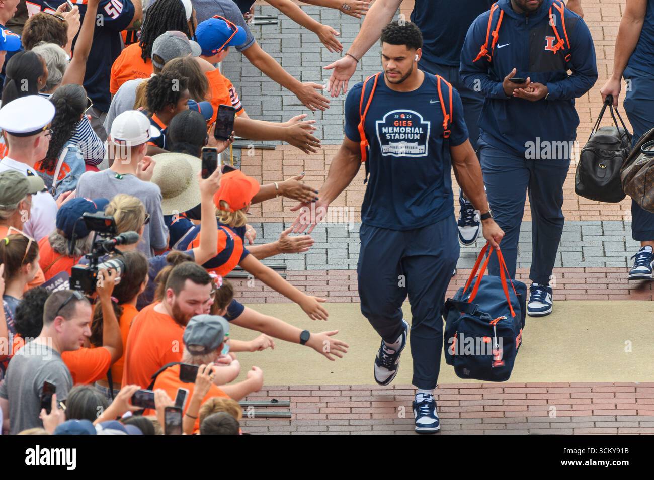 Illinois running back Kaden Feagin greets fans prior to an NCAA college ...