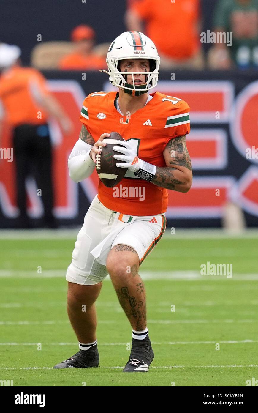 Miami quarterback Carson Beck looks to pass during the first half of an ...