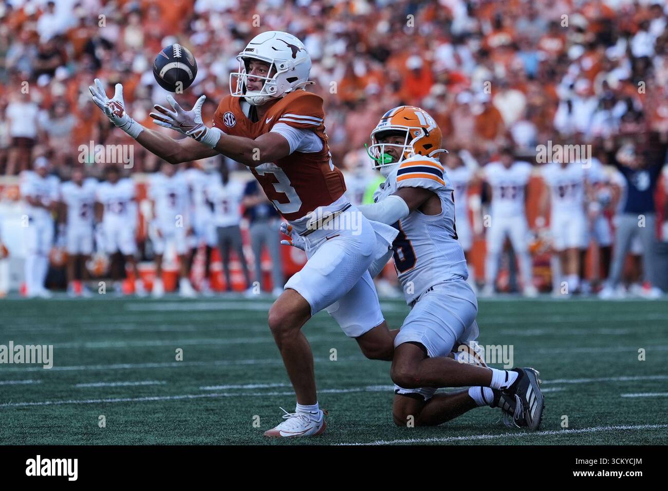 Texas wide receiver Parker Livingstone (13) reaches to make a catch in ...