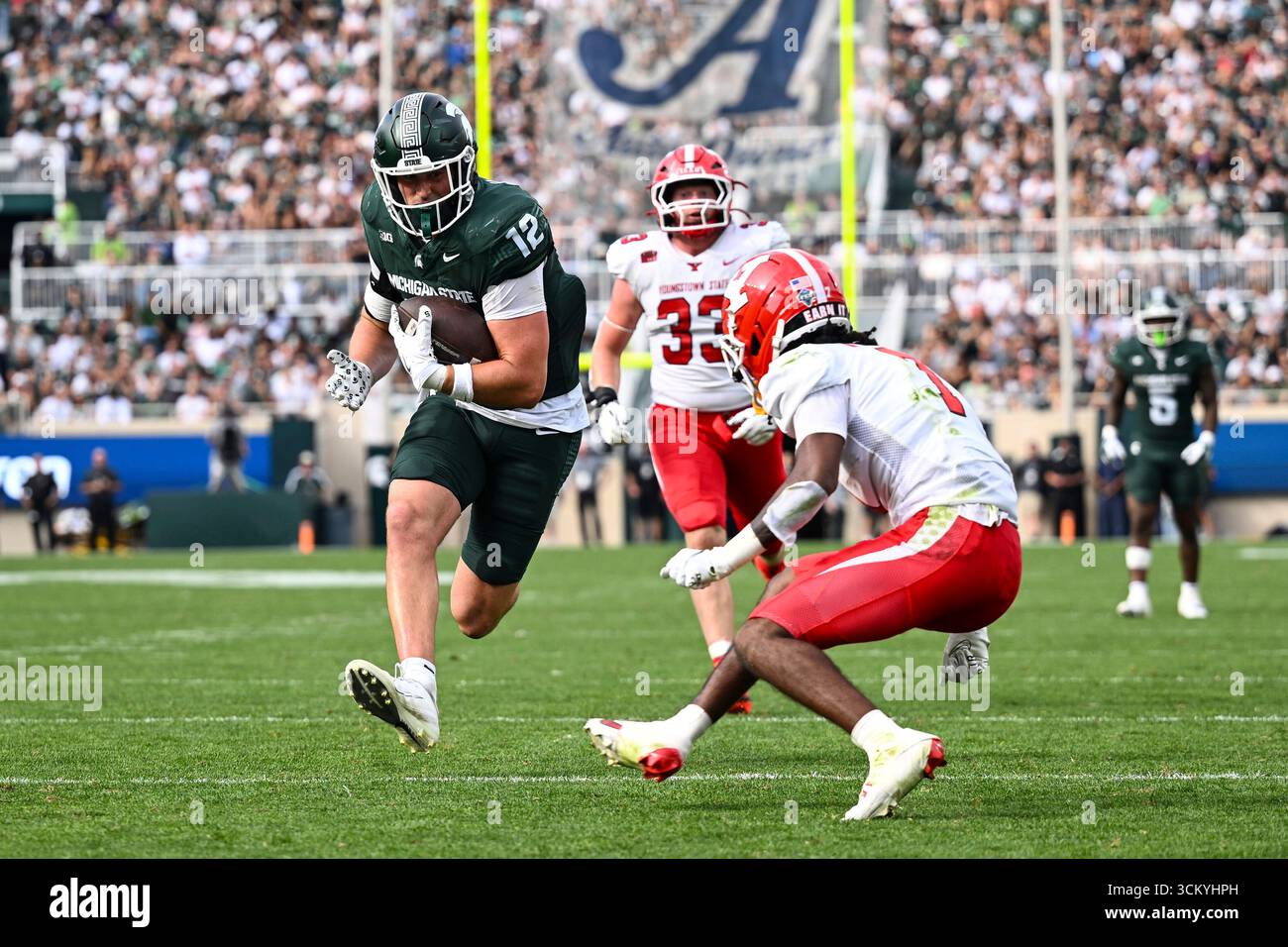 EAST LANSING, MI - SEPTEMBER 13: Michigan State Spartans tight end Jack Velling (12) braces for ...