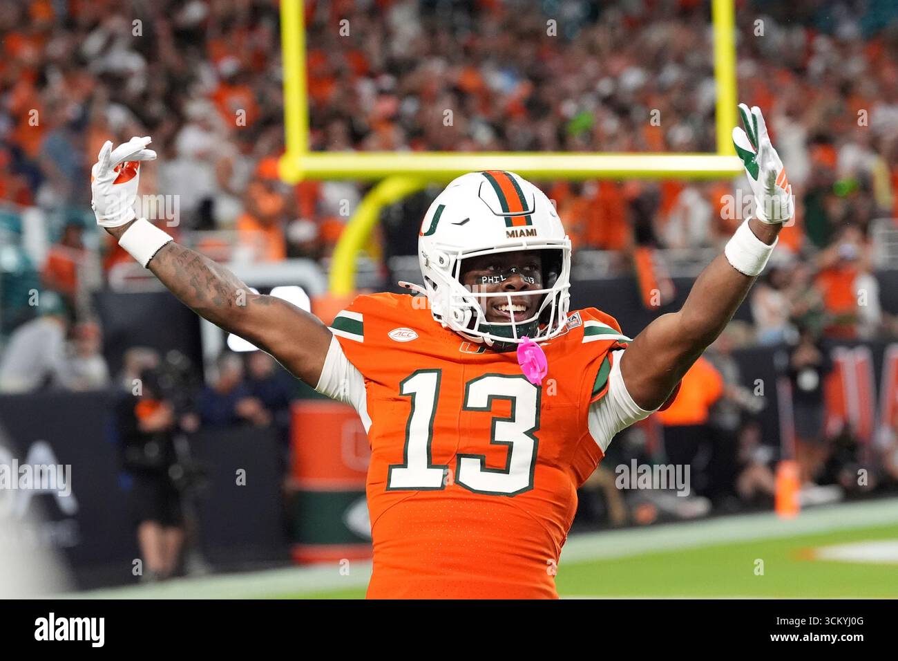 Miami defensive back Bryce Fitzgerald celebrates after making an ...