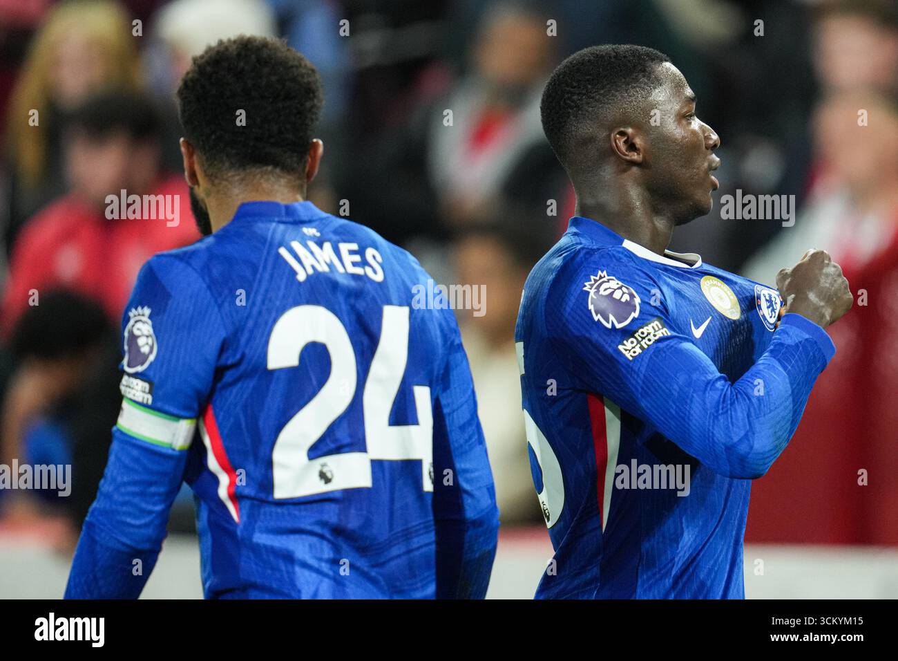 Moisés Caicedo of Chelsea touches the badge to Chelsea fans after goal ...
