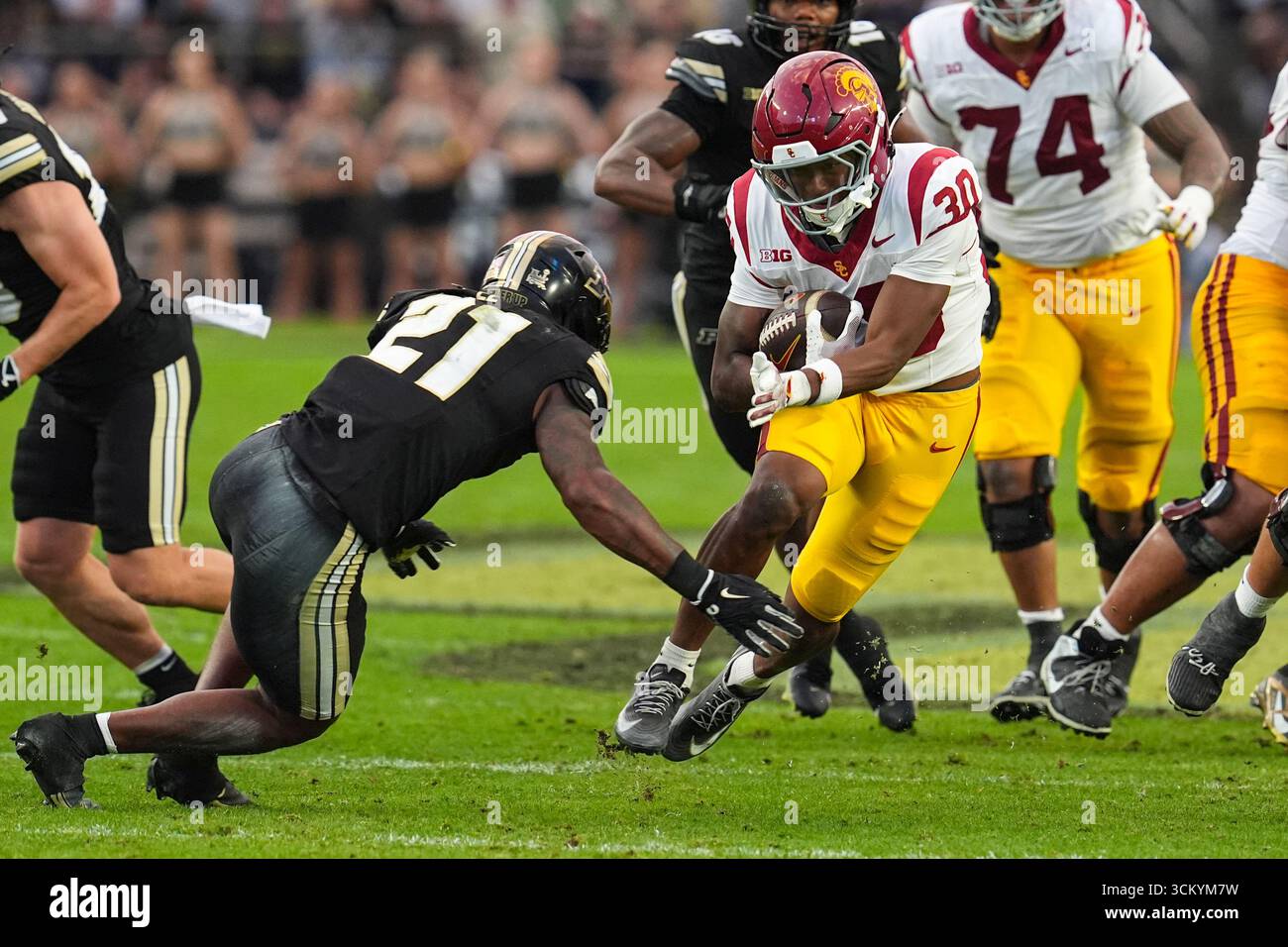 Southern California running back King Miller (30) cuts aways from ...