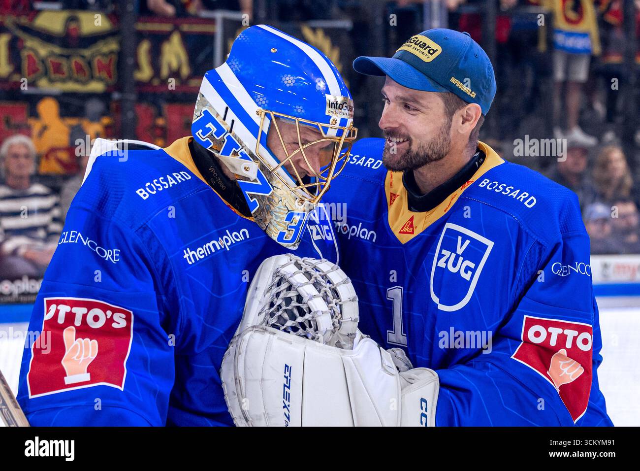 Goalkeeper Leonardo Genoni #30 (EV Zug) and goalkeeper Tim Wolf #1 (EV ...