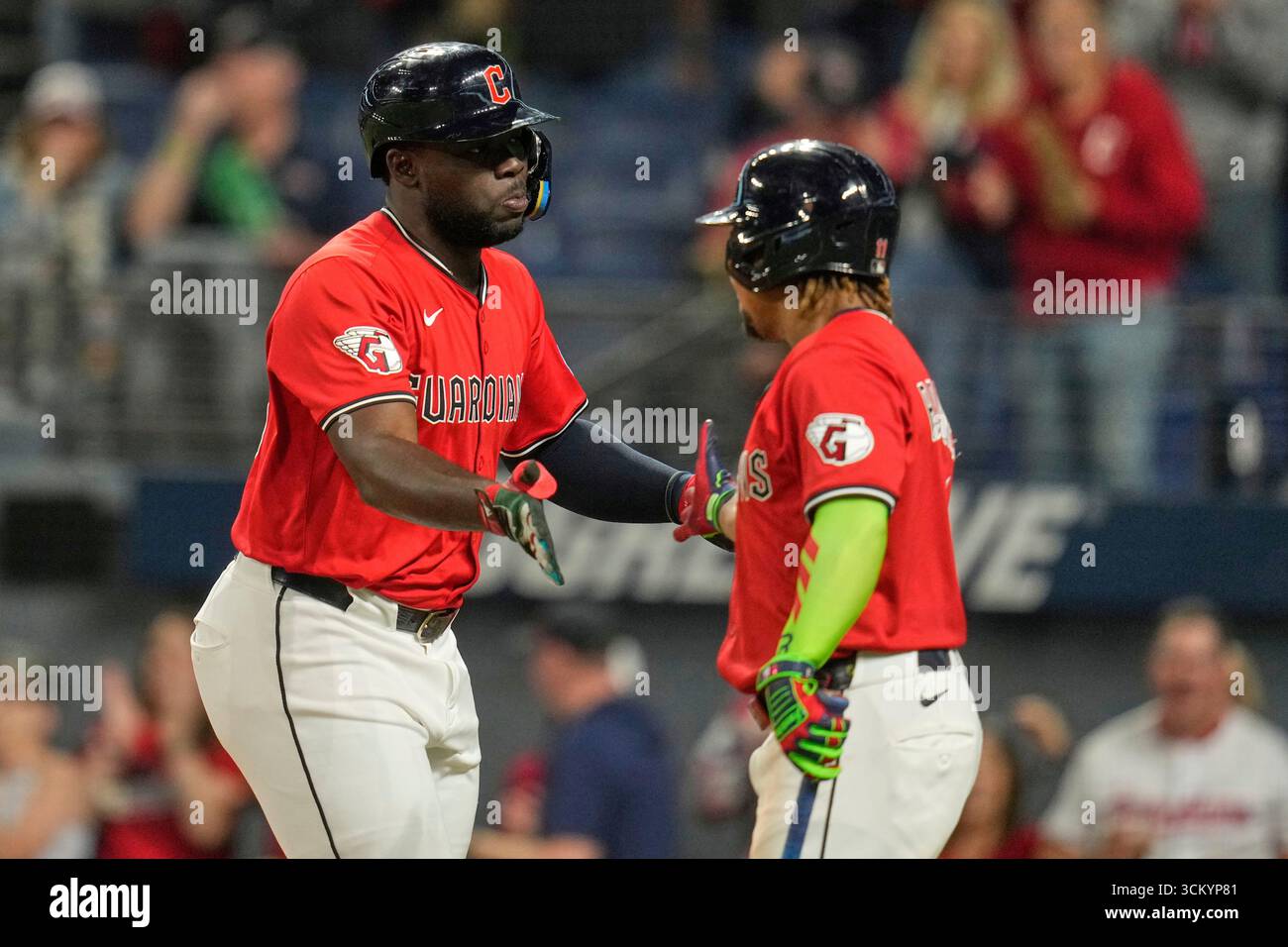 Cleveland Guardians' Jhonkensy Noel, left, is congratulated by Jose ...