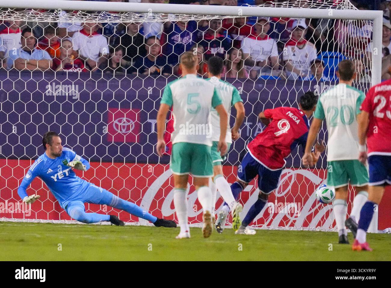 FC Dallas forward Petar Musa (9) scores a goal on Austin FC goalkeeper ...