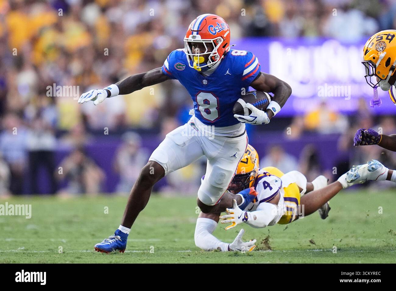 Florida wide receiver Vernell Brown III (8) carries against LSU cornerback Mansoor Delane (4) in ...