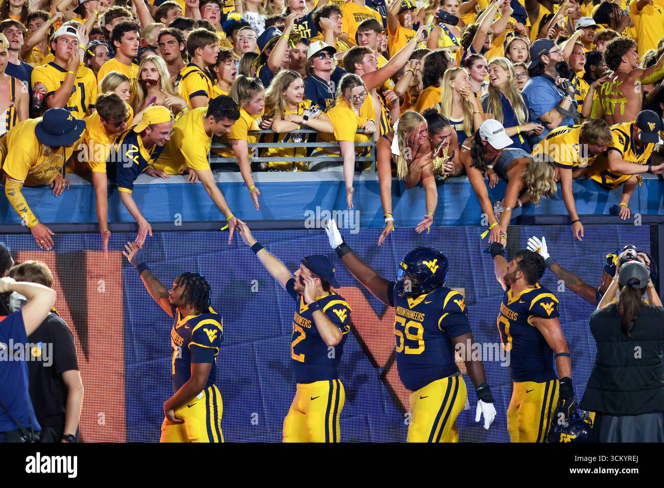 MORGANTOWN, WV - SEPTEMBER 13: West Virginia Mountaineers fans and ...