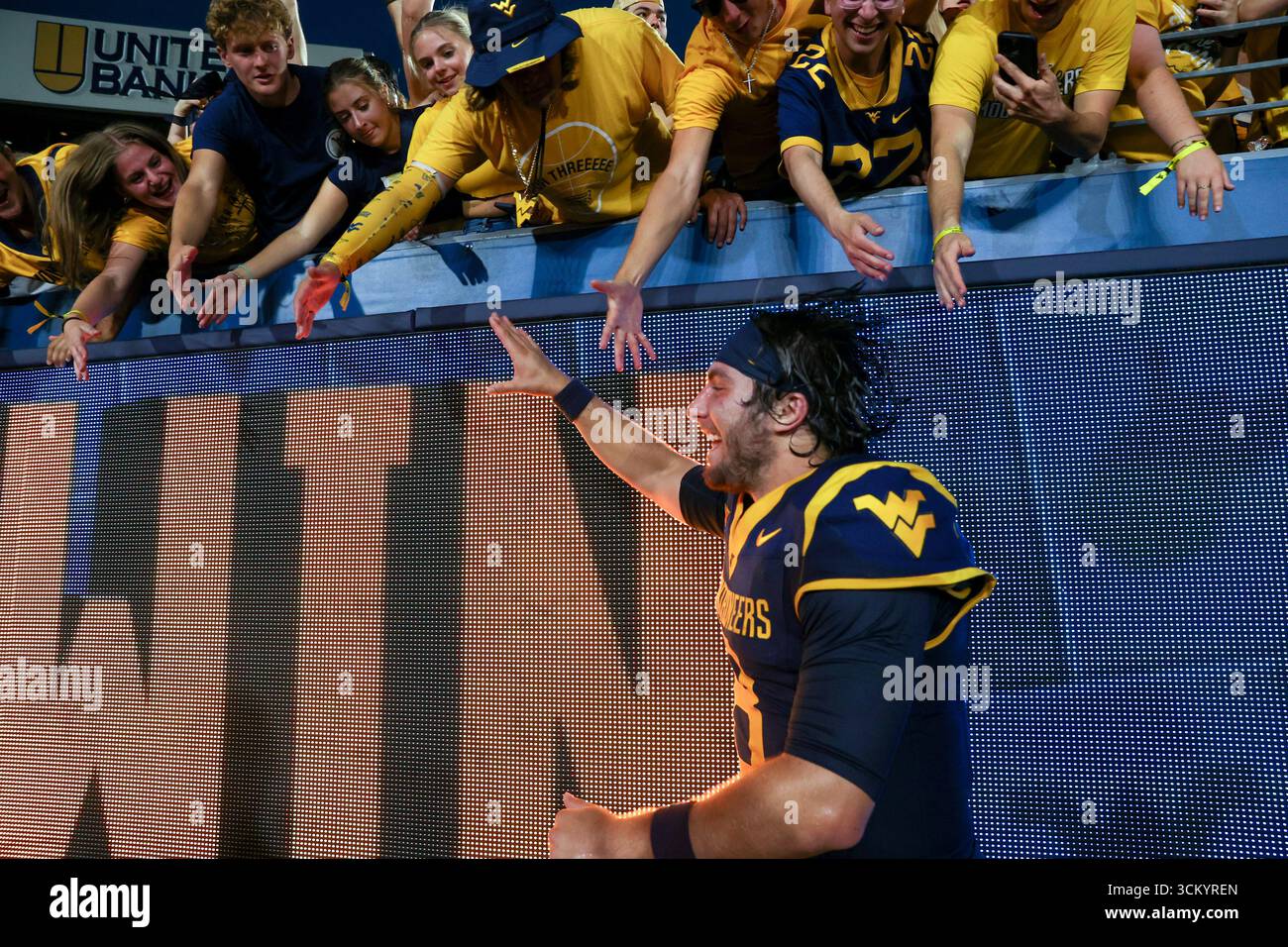 MORGANTOWN, WV - SEPTEMBER 13: West Virginia Mountaineers quarterback ...