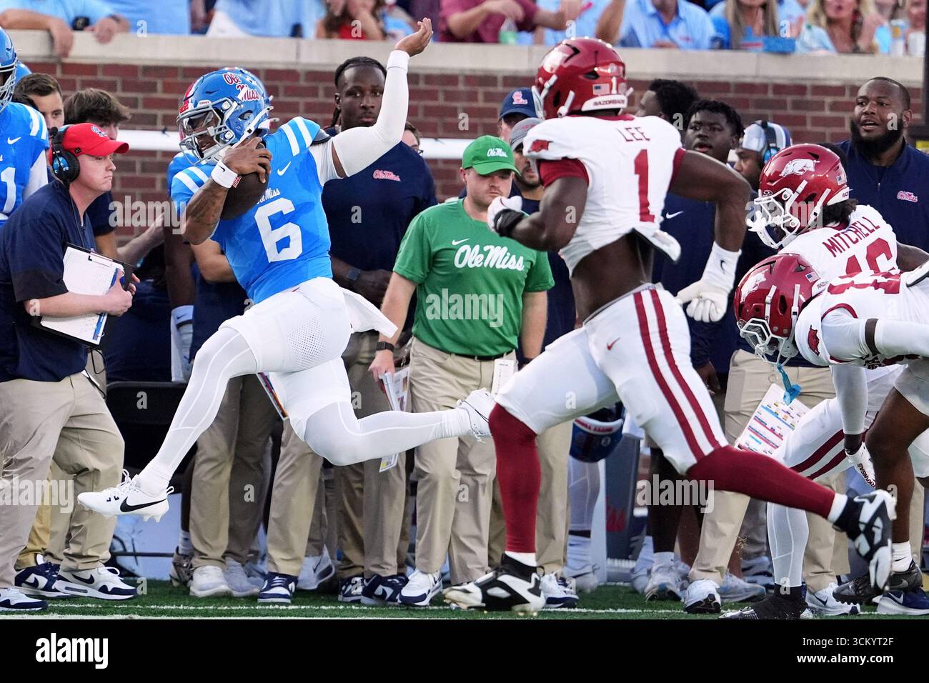 Mississippi quarterback Trinidad Chambliss (6) runs out of bounds for a ...