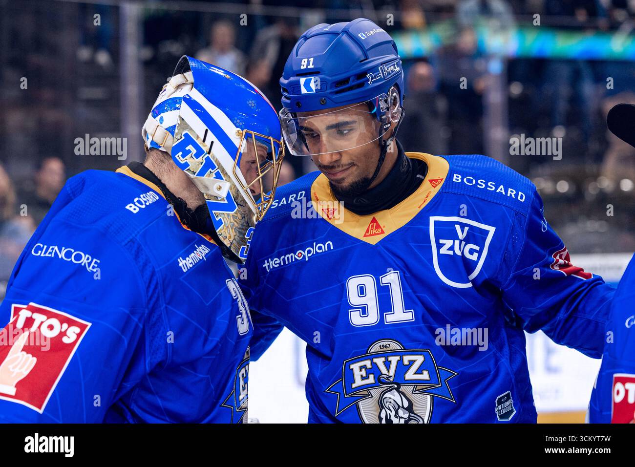 Goalkeeper Leonardo Genoni #30 (EV Zug) and Dorian Moret #91 (EV Zug ...