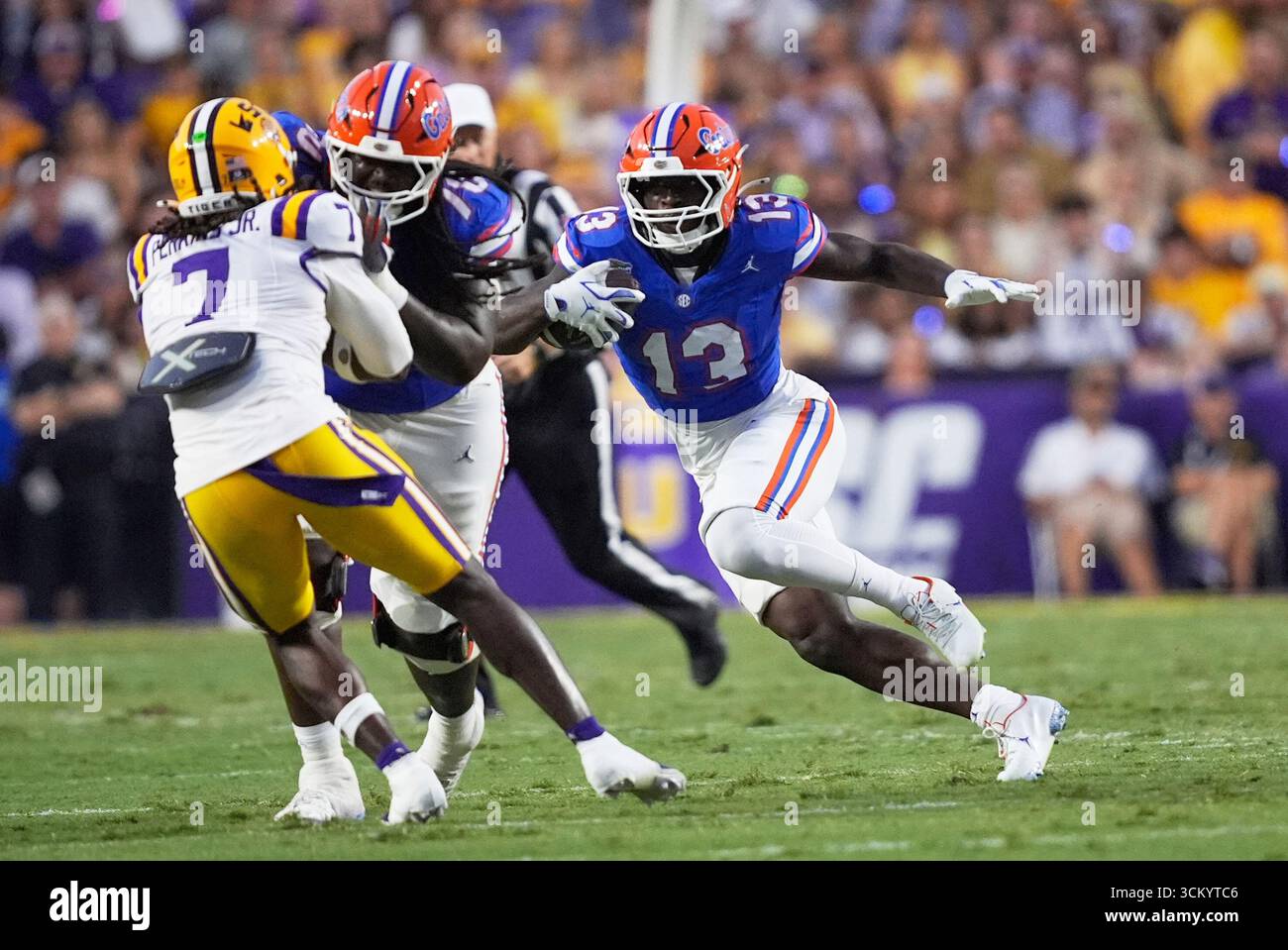 Florida defensive back Aaron Gates (13) carries against LSU linebacker ...
