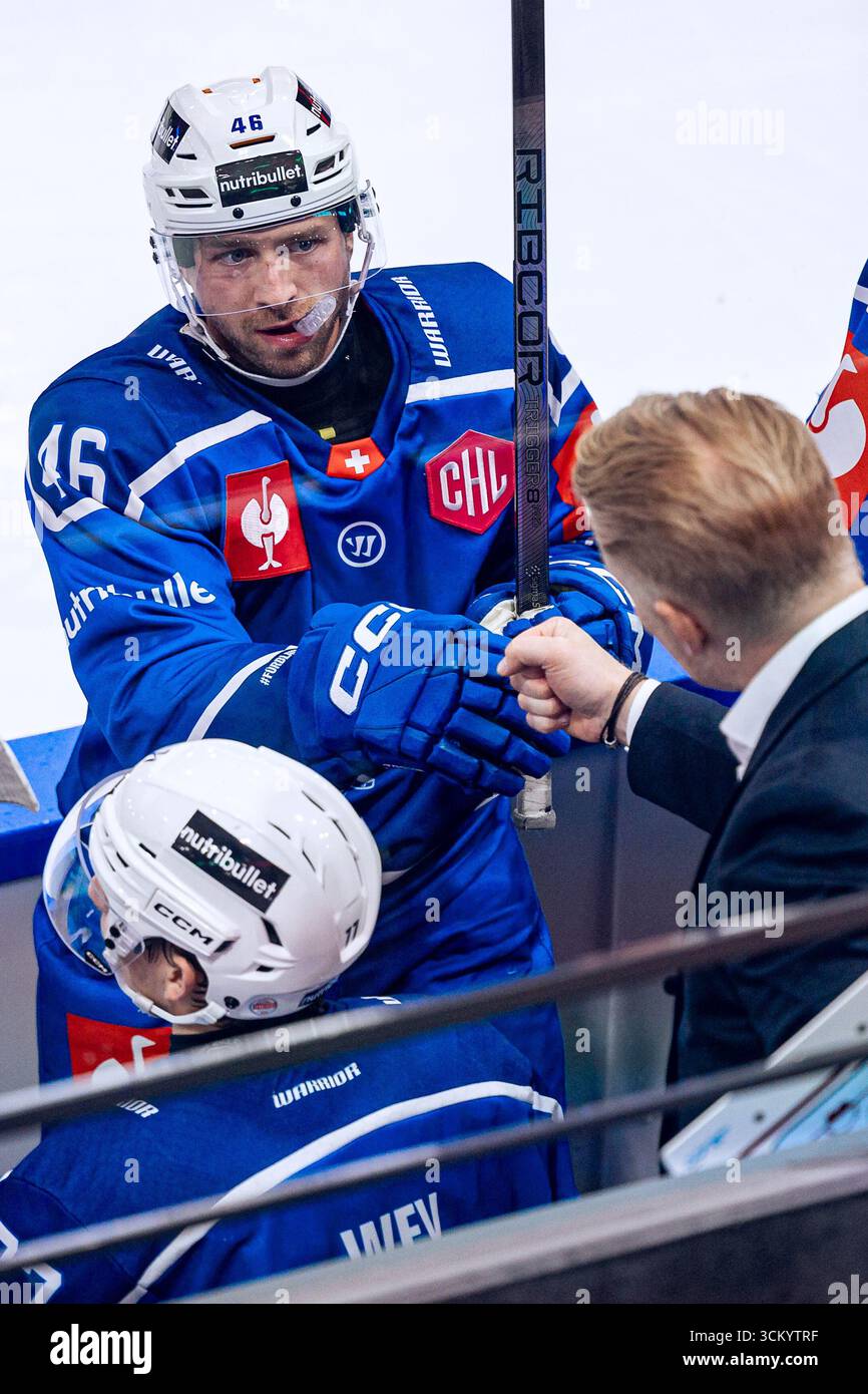 Lino Martschini #46 (EV Zug) and Head Coach Michael Liniger (EV Zug ...