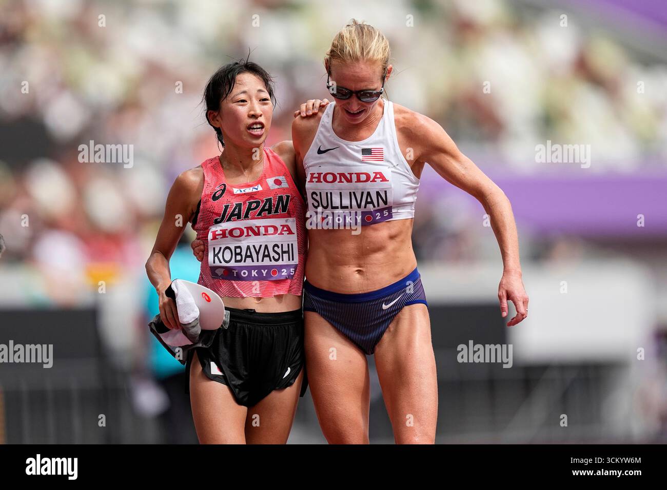Japan's Kana Kobayashi and United States' Susanna Sullivan embrace ...