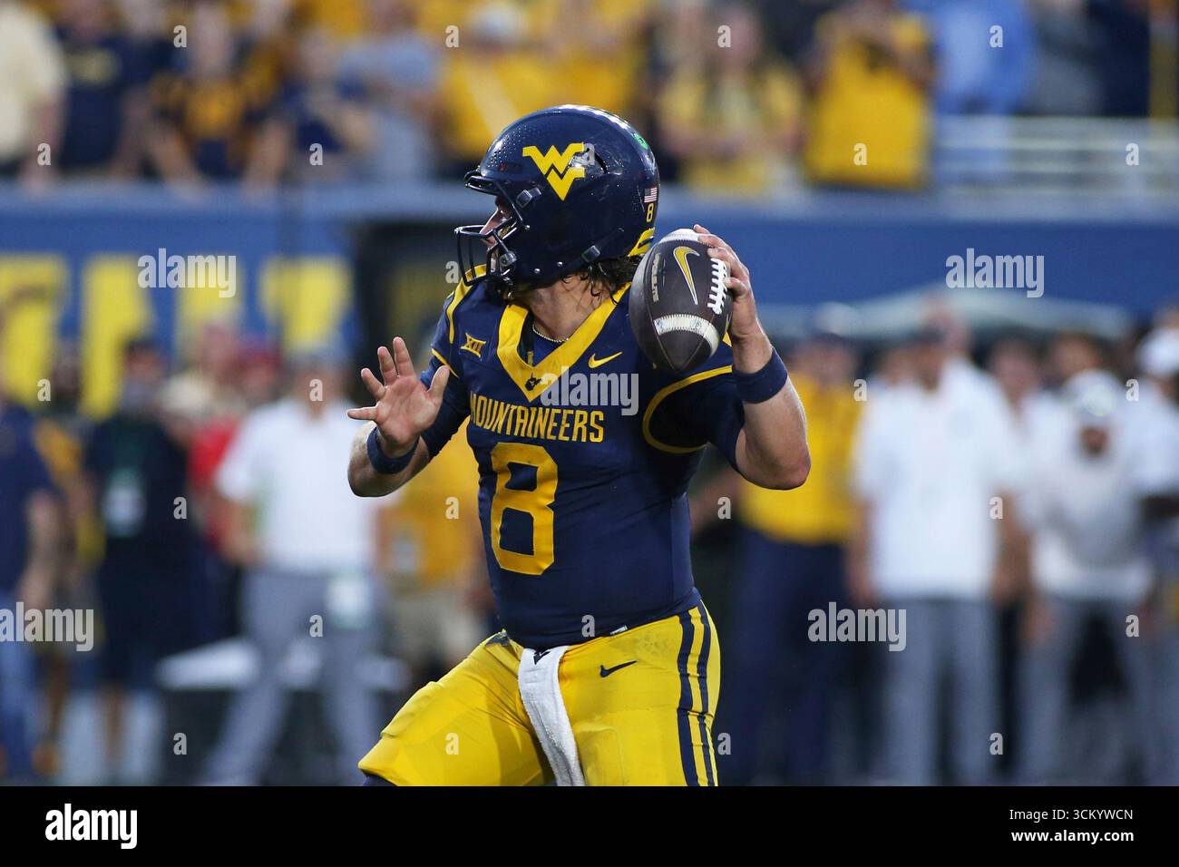 West Virginia quarterback Nicco Marchiol (8) passes during the second ...