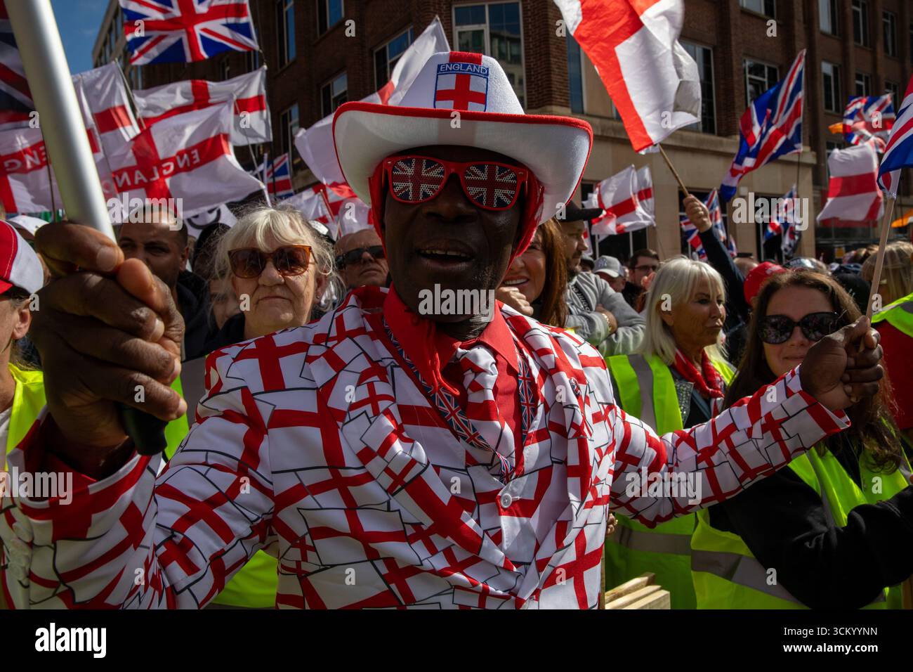An English patriot wearing a St Georges flag hat and suit seen during a ...