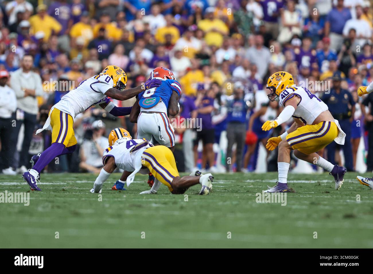 September 13, 2025: Florida's Vernell Brown III (8) is tackled by LSU's ...