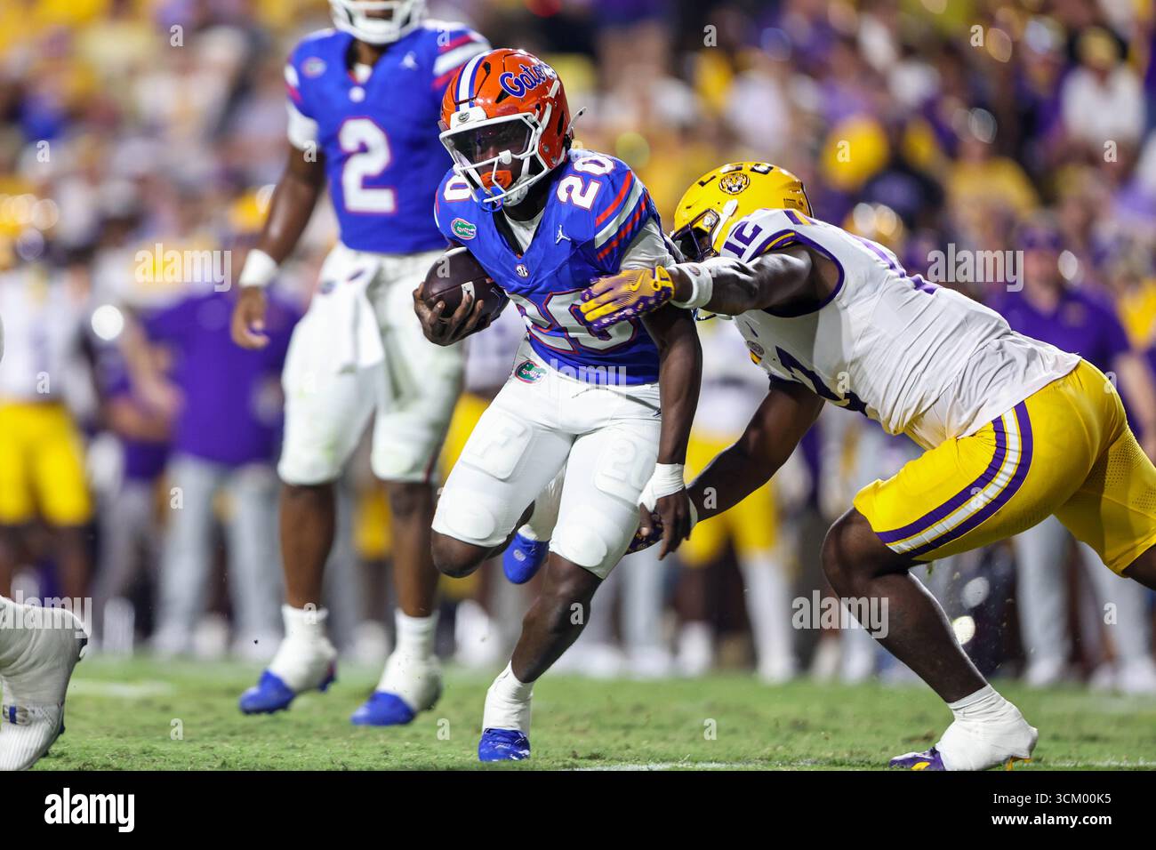 September 13, 2025: Florida running back Duke Clark (20) breaks a ...