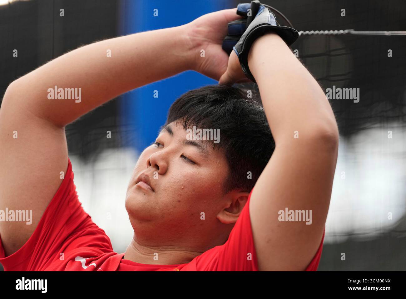 China's Zhang Jiale competes in the women's hammer throw qualification ...