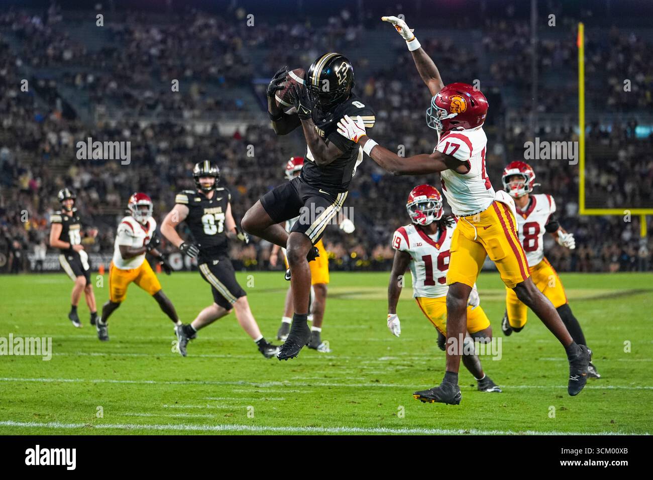 Purdue wide receiver Nitro Tuggle (0) makes a catch for a touchdown in ...
