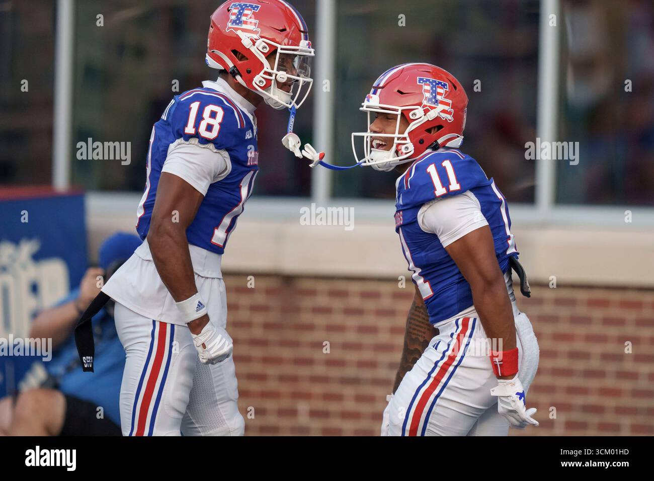 Louisiana Tech wide receiver Jalen Mickens (11) celebrates a touchdown ...