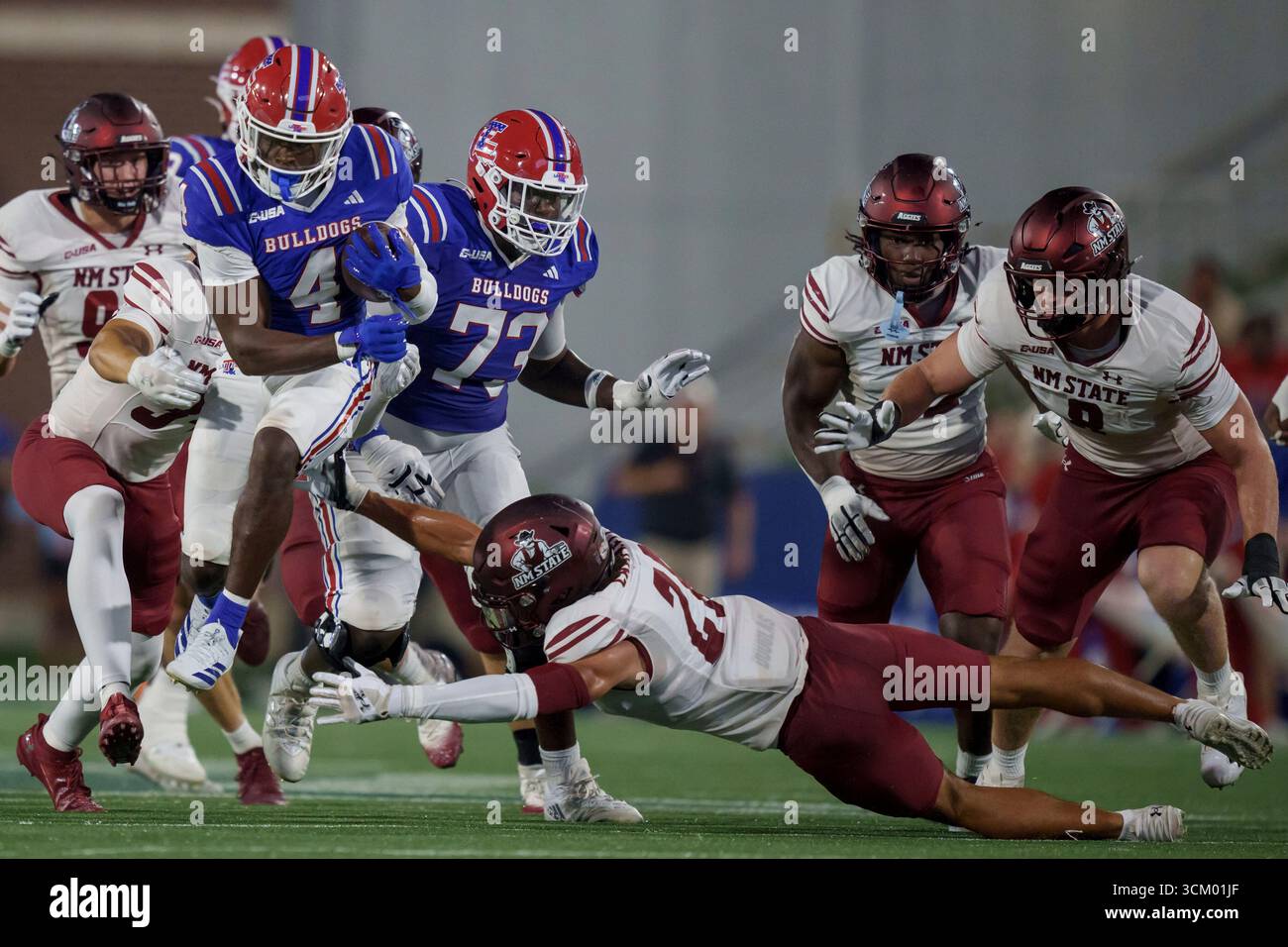 Louisiana Tech running back Clay Thevenin (4) runs against New Mexico ...