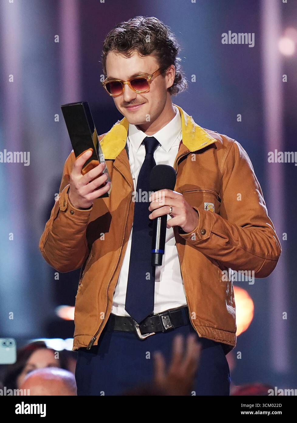 Owen Riegling accepts the Album of the Year award at the Canadian ...