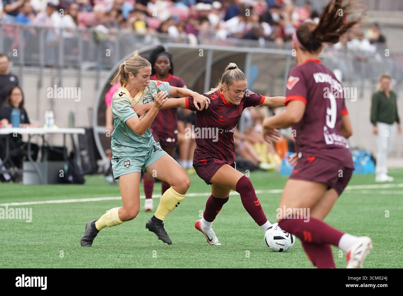 Kaylee Hunter #11 of AFC Toronto and Anna Bout #4 of Vancouver Rise FC ...