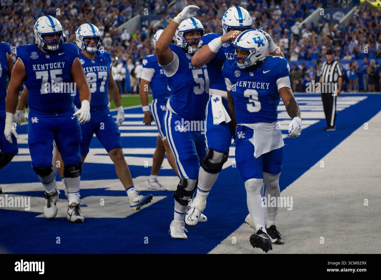 Kentucky running back Seth McGowan (3) celebrates after scoring a ...