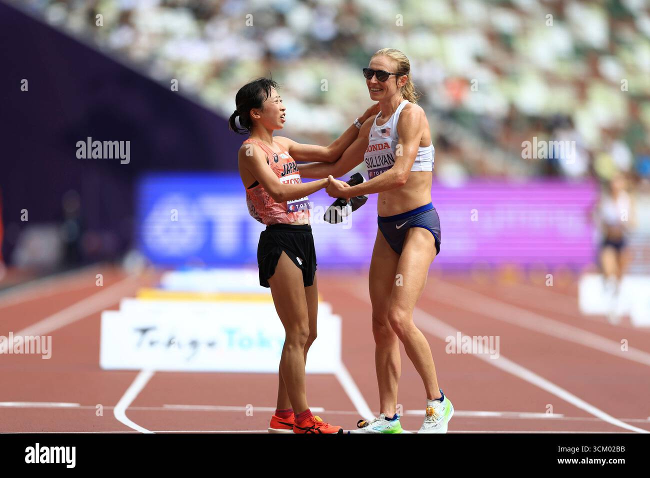 Susanna SULLIVAN of US(R) and Kana KOBAYASHIof Japan celebrate after ...