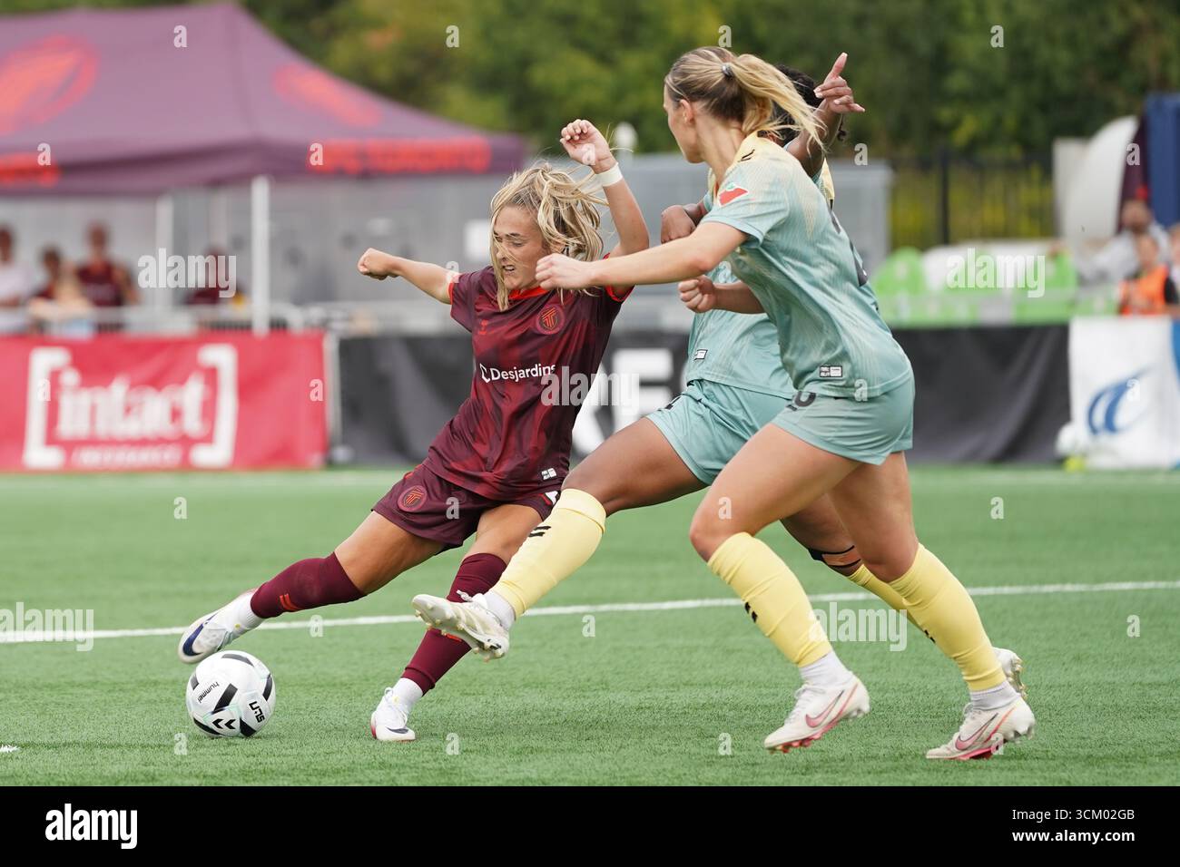 Kaylee Hunter #11 of AFC Toronto kick the ball during the Northern ...