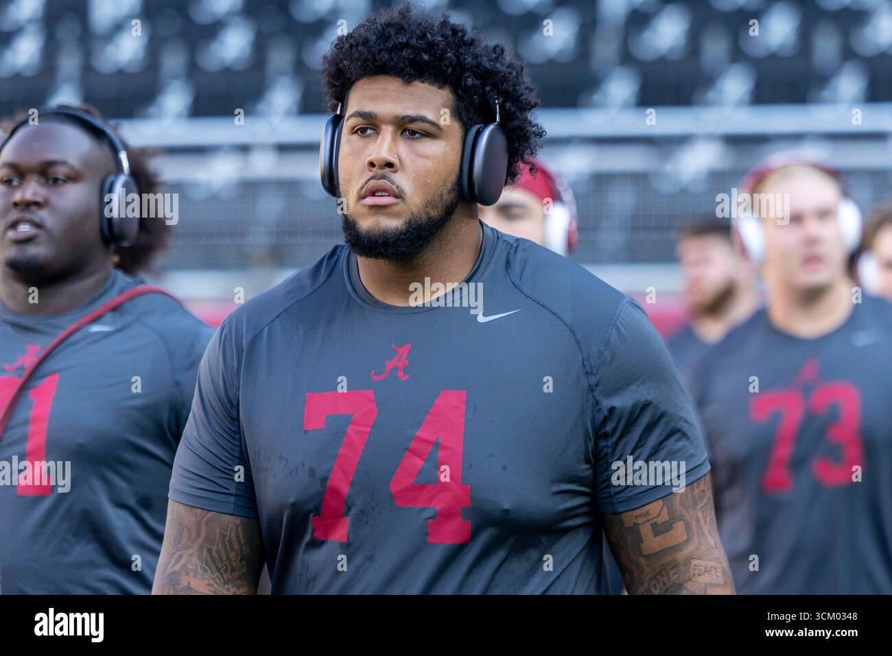Alabama offensive lineman Kadyn Proctor (74) warms up before an NCAA ...