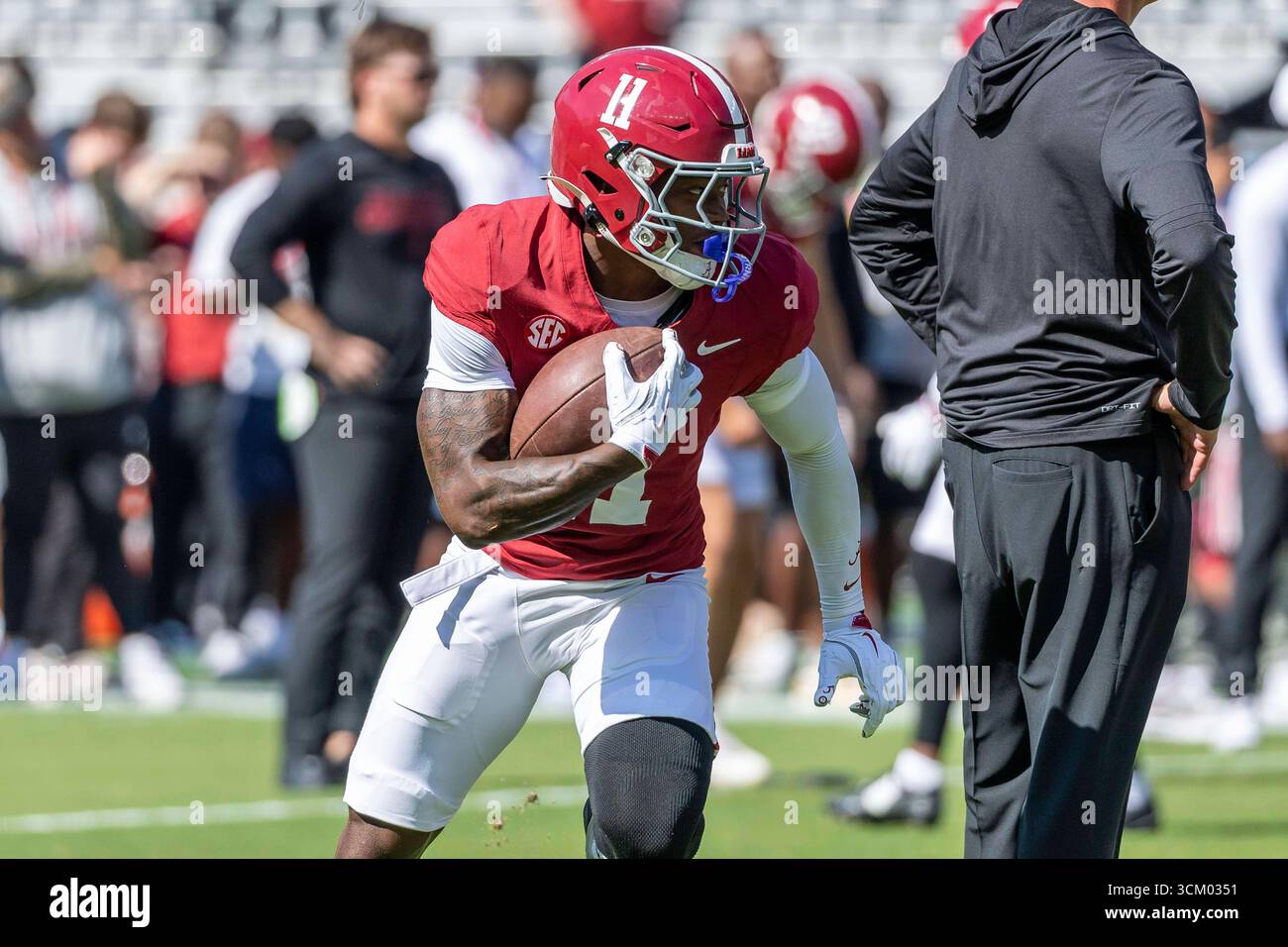 Alabama wide receiver Rico Scott (11) warms up before an NCAA college ...