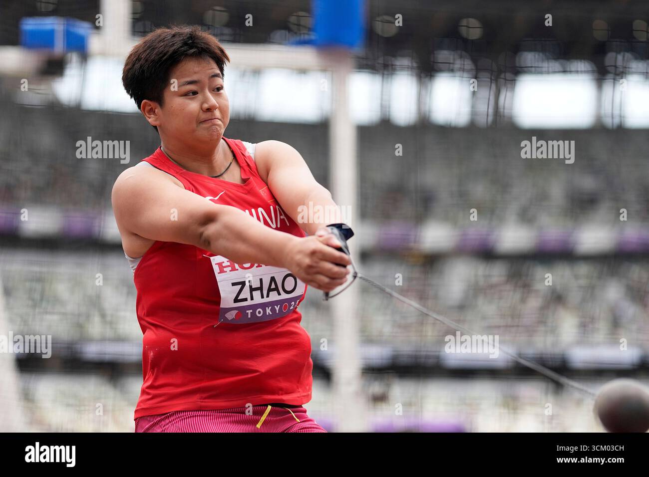 China's Zhao Jie makes an attempt in the women's hammer throw qualification at the World ...