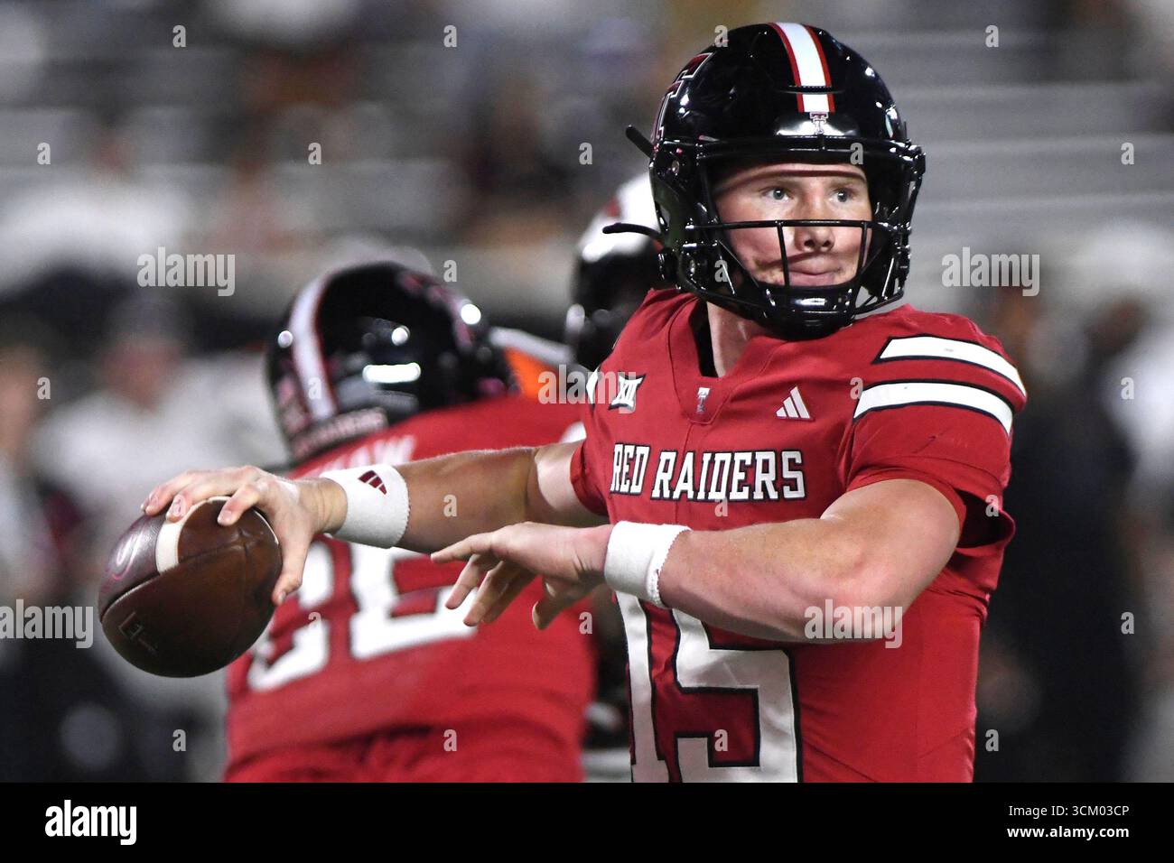 Texas Tech quarterback Will Hammond (15) prepares to throw the ball ...