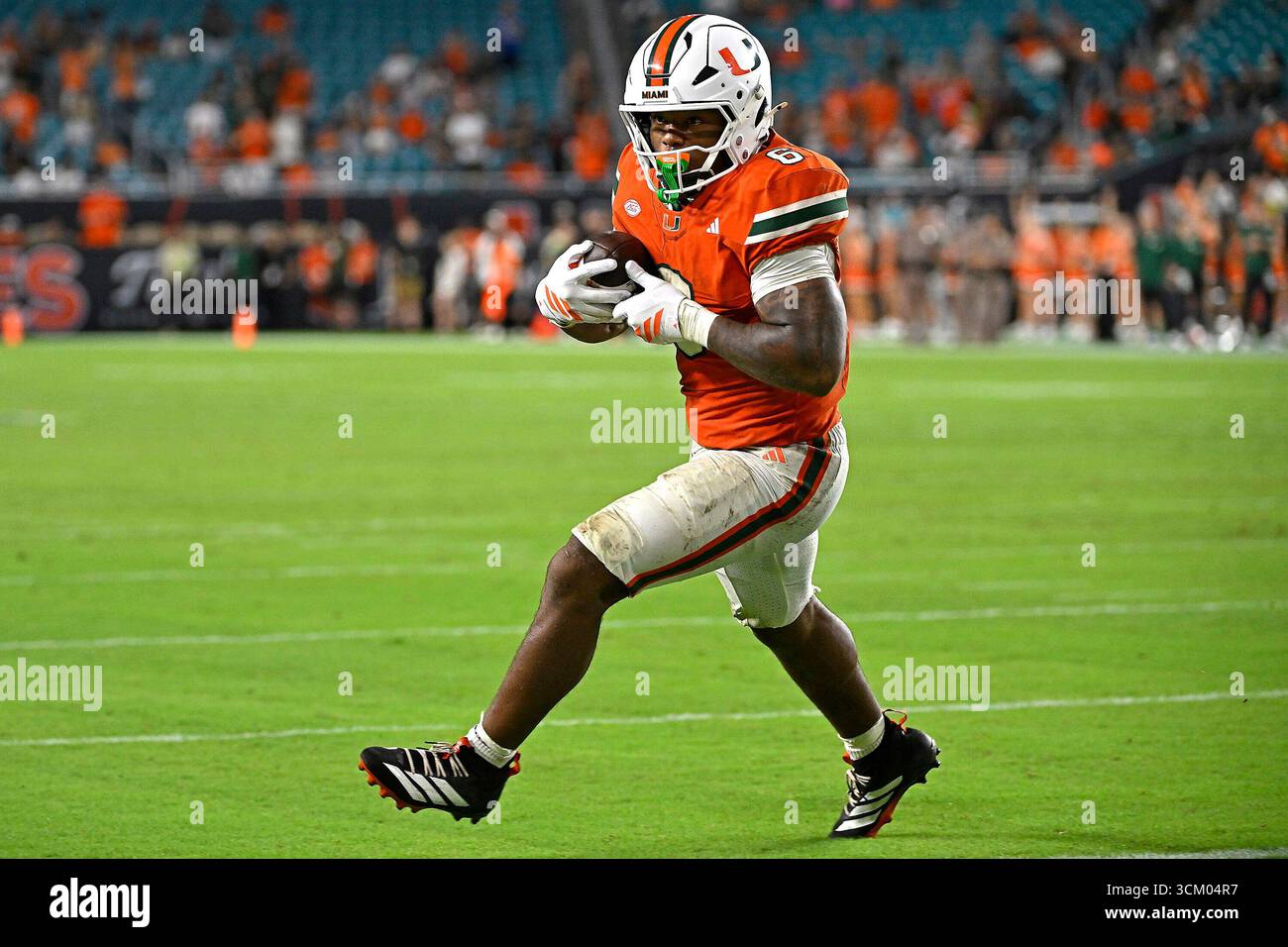 MIAMI GARDENS, FL - SEPTEMBER 13: Miami running back CharMar Brown (6 ...