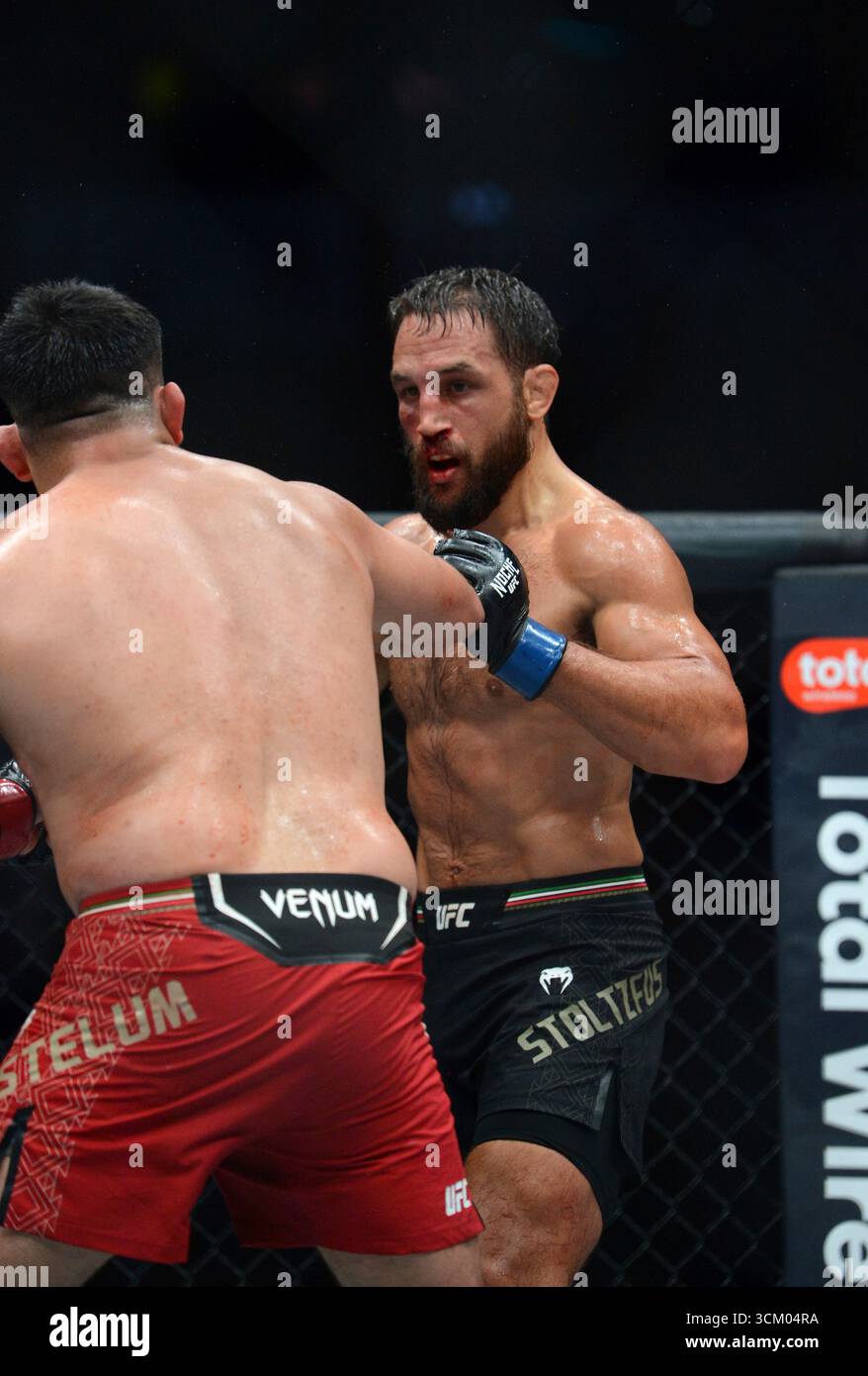 SAN ANTONIO, TX - SEPTEMBER 13: Dustin Stoltzfus (right) fights Kelvin ...