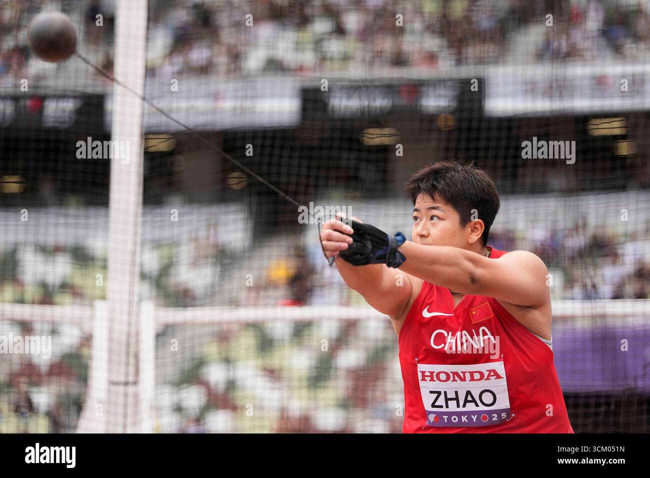 China's Zhao Jie competes in the women's hammer throw qualification at ...