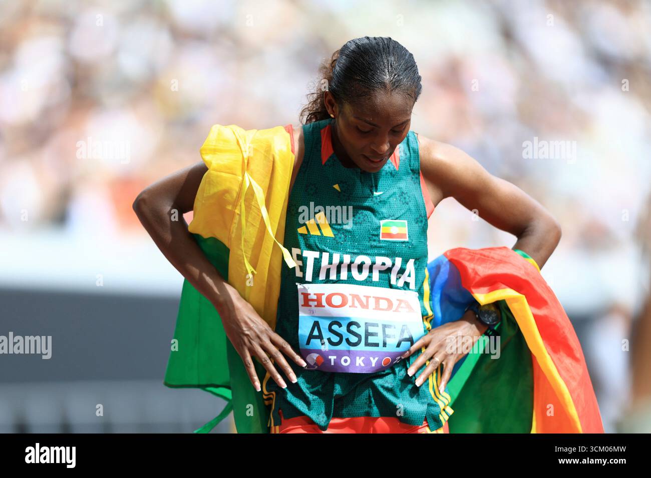 Tigst ASSEFA of Ethiopia reacts after placing 2nd in the Women's ...