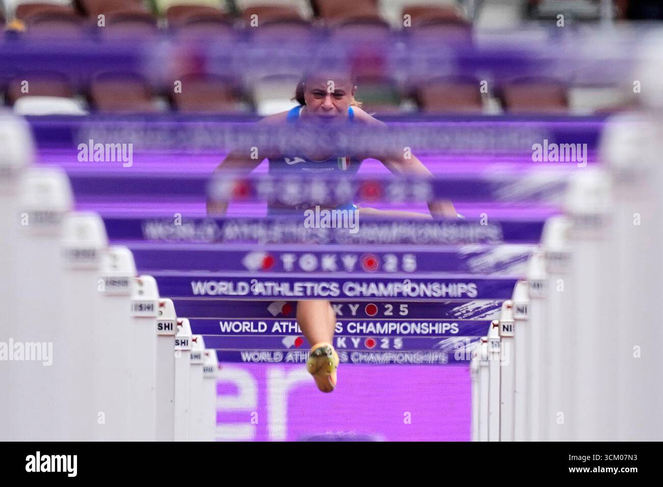 Italy's Elena Carraro competes in a women's 100 meters hurdles heat at ...