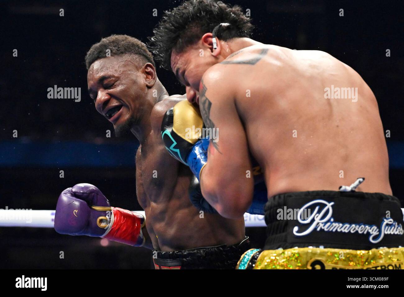 Christian Mbilli, left, fights Lester Martinez during a WBC super ...