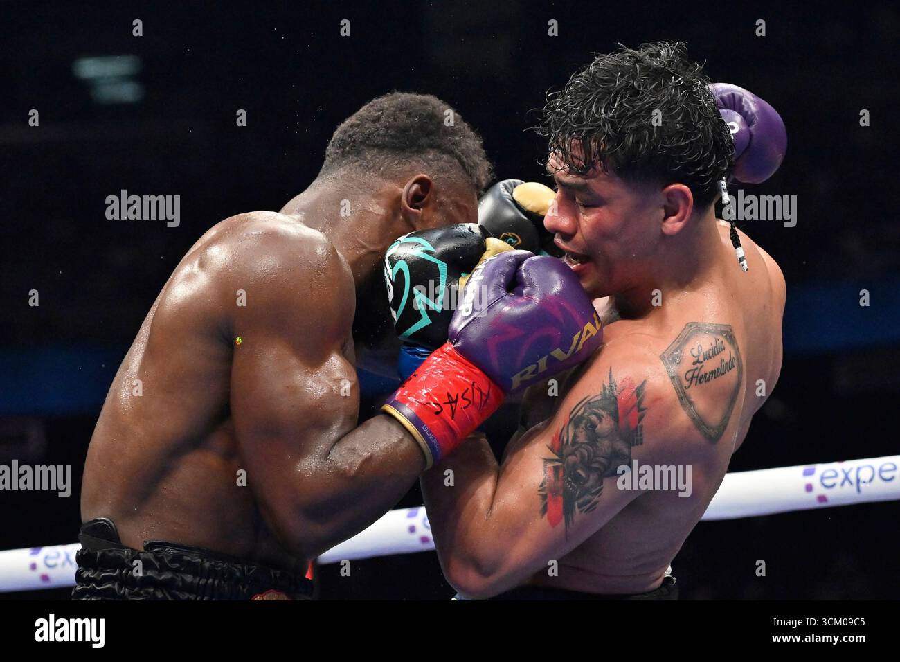 Christian Mbilli, left, fights Lester Martinez during a WBC super ...