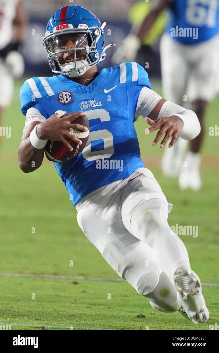 Mississippi quarterback Trinidad Chambliss dives to the ground during ...