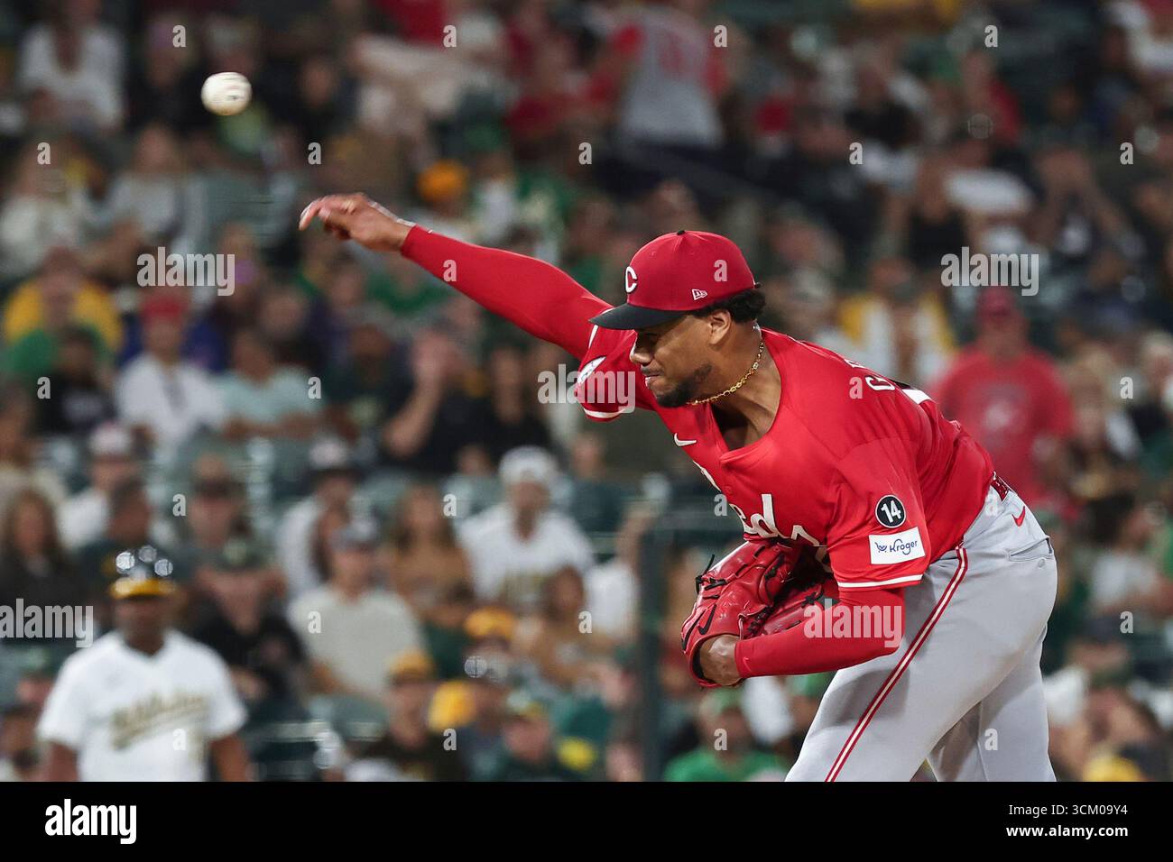 Cincinnati Reds pitcher Hunter Greene throws to the Athletics during ...