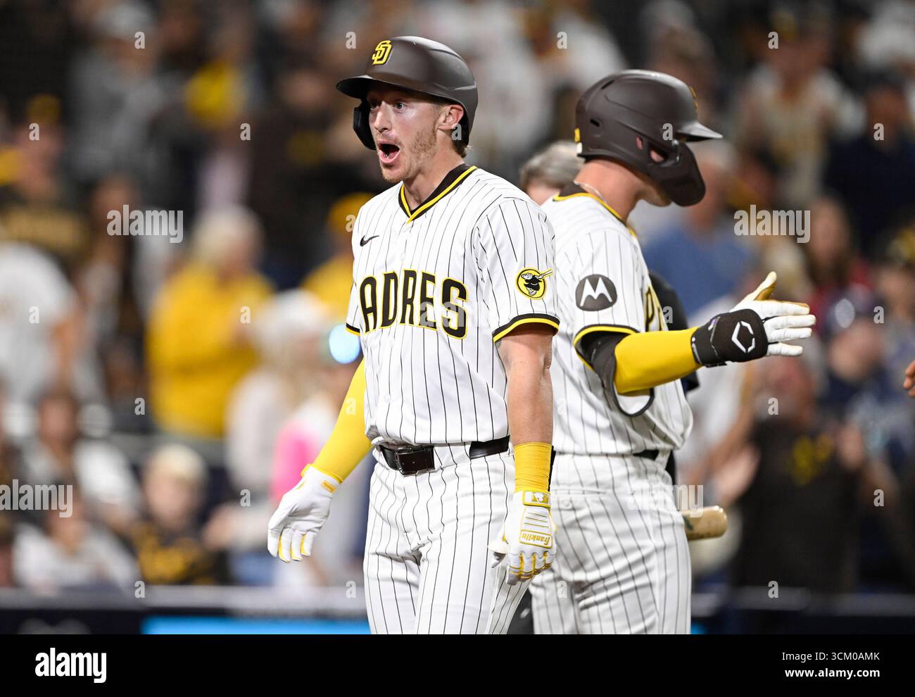 San Diego Padres Bryce Johnson, left, celebrates after hitting a solo ...