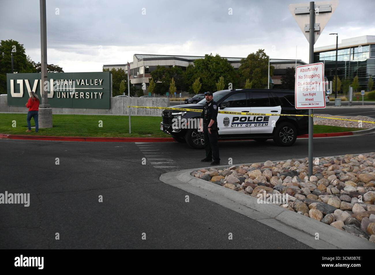 Orem, Utah, USA. 14th Sep, 2025. Police stand and watch during the Charlie Kirk Memorial Drive ...