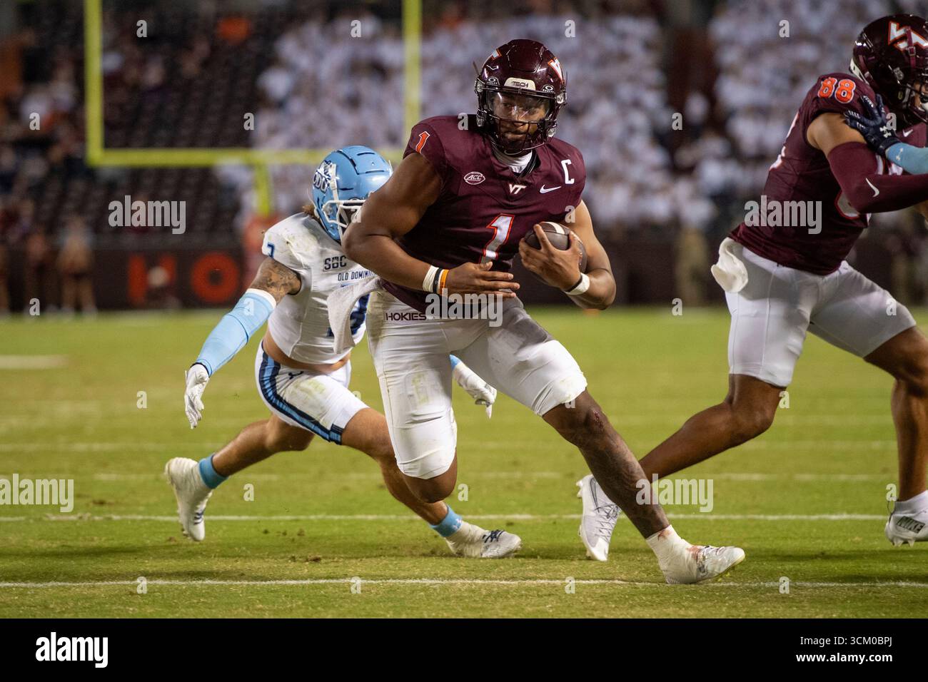 Virginia Tech quarterback Kyron Drones (1) runs for a touchdown against ...